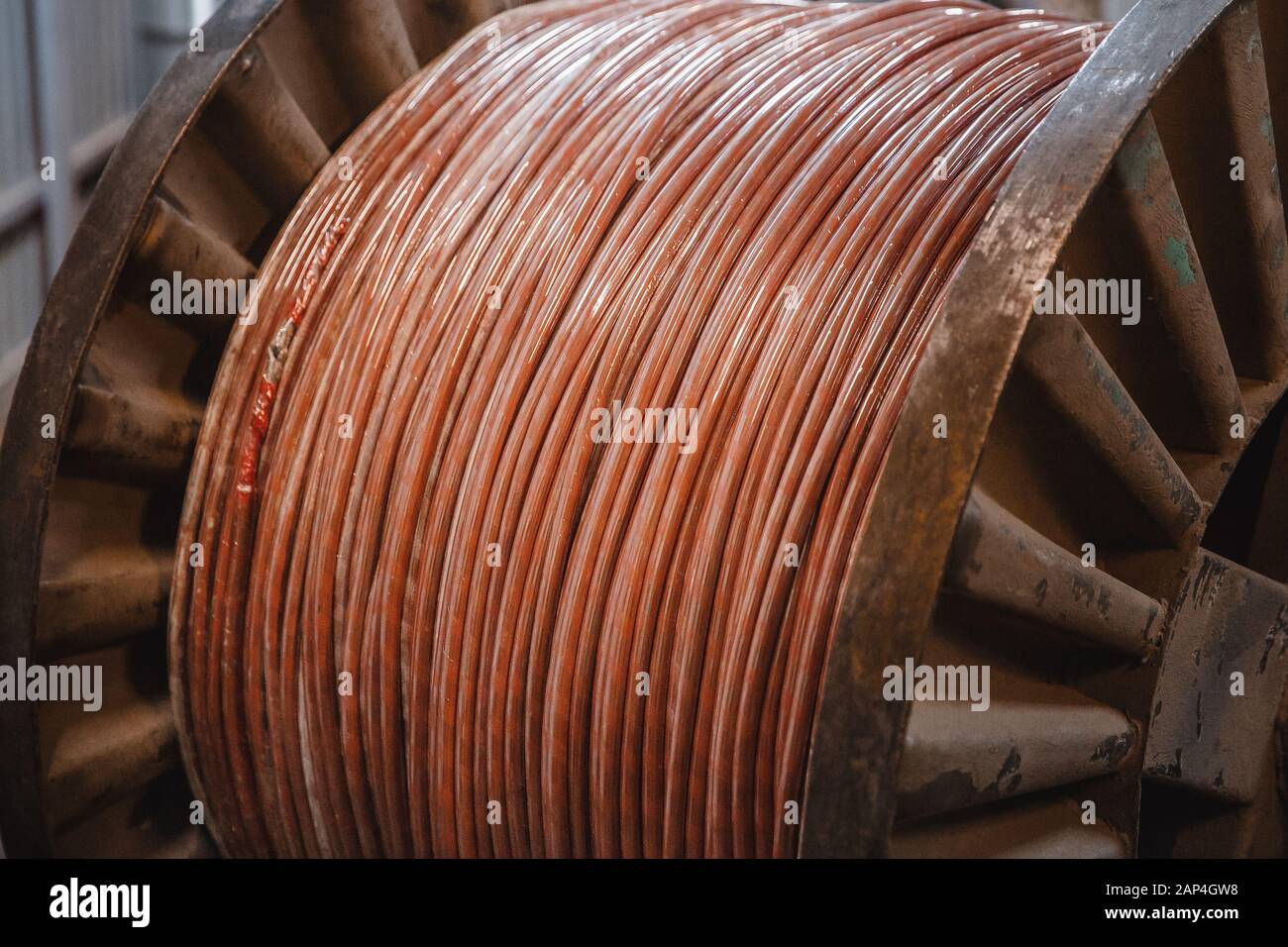 Production of copper wire, bronze cable in reels at factory Stock Photo ...