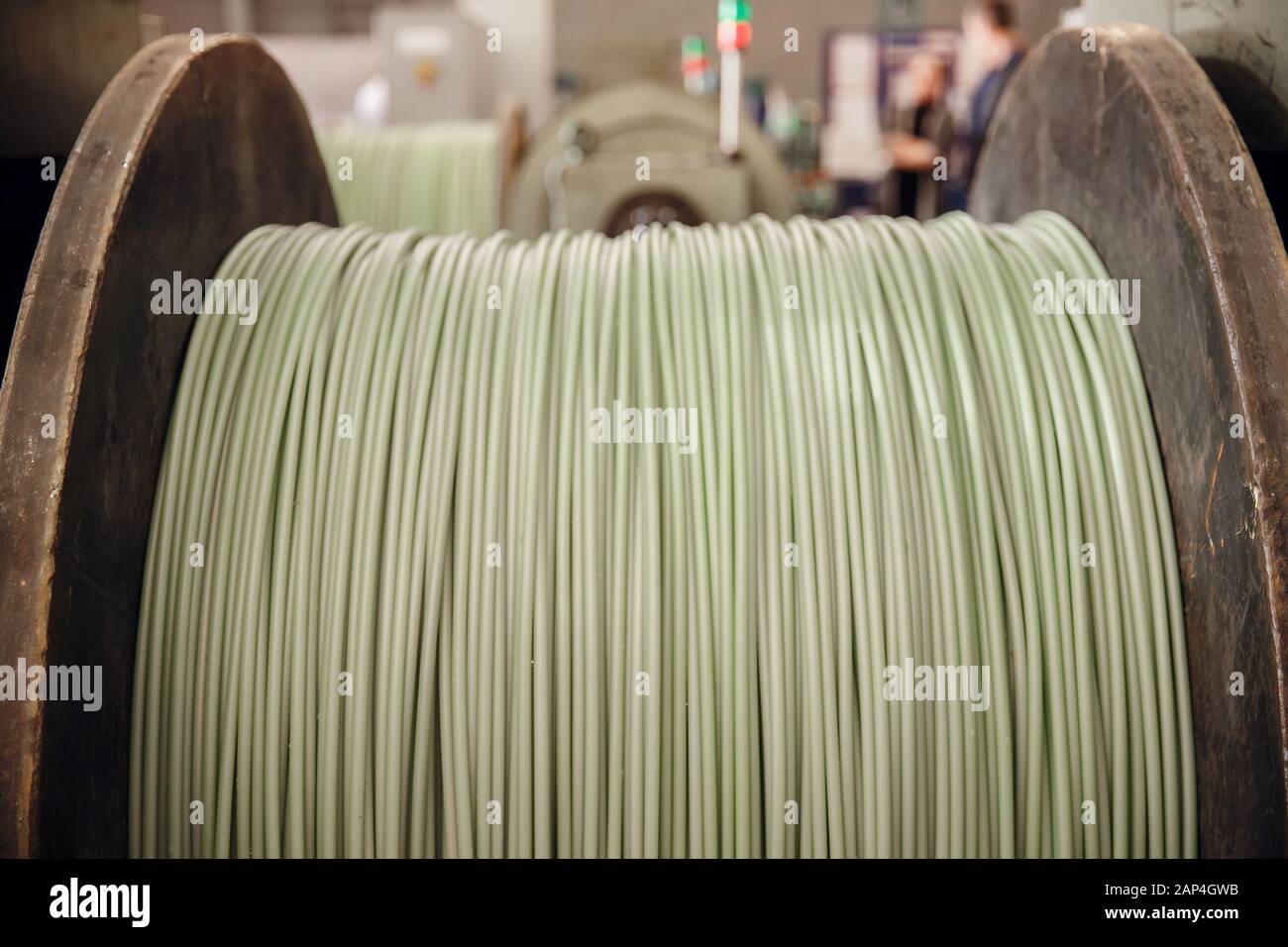 Production of copper wire, bronze cable in reels at factory Stock Photo ...