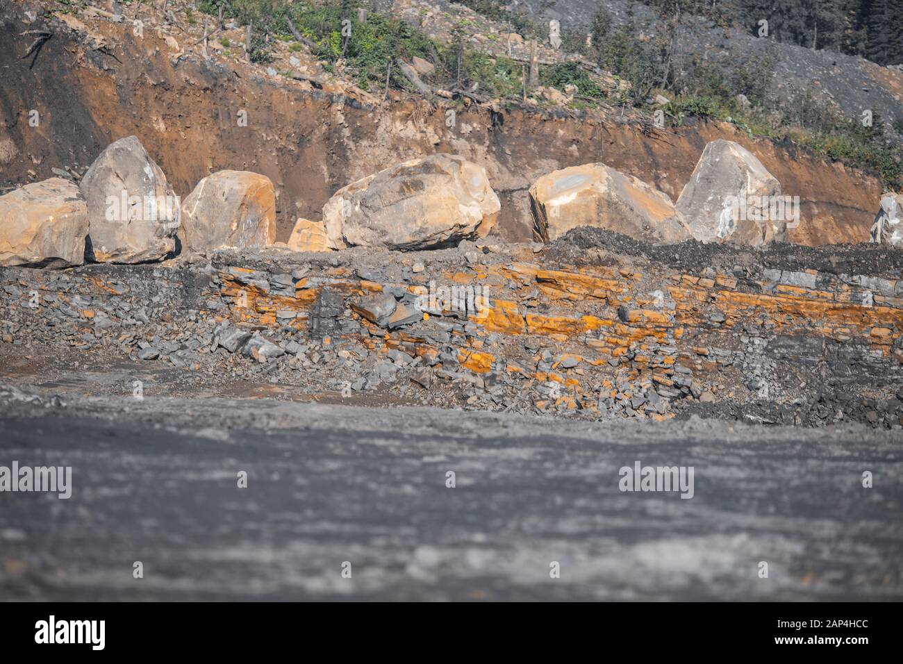 Geological section of soil, layers of coal gold. Overburden open mine ...