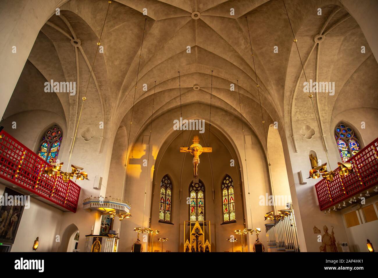 Lulea Sweden Catholic Cathedral in sunlight, statue of Jesus on cross ...
