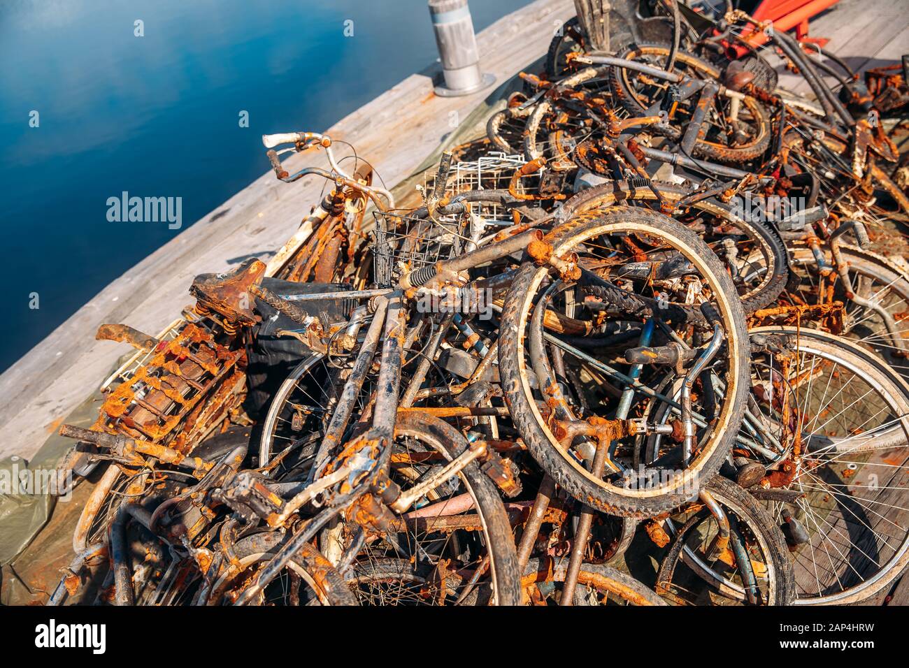 Pile of rusty bicycles got out water, cleaning rivers and canals of ...