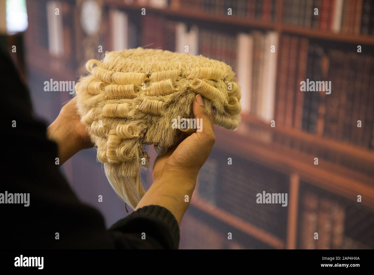 A wig being held, as worn by some judges and barristers in England and ...