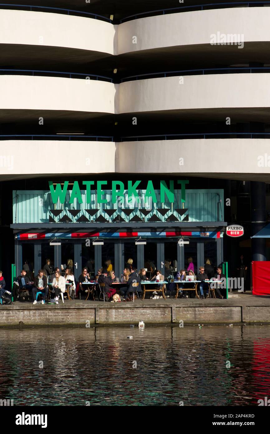 People enjoying a sunny day on the terrace of the "waterkant ...
