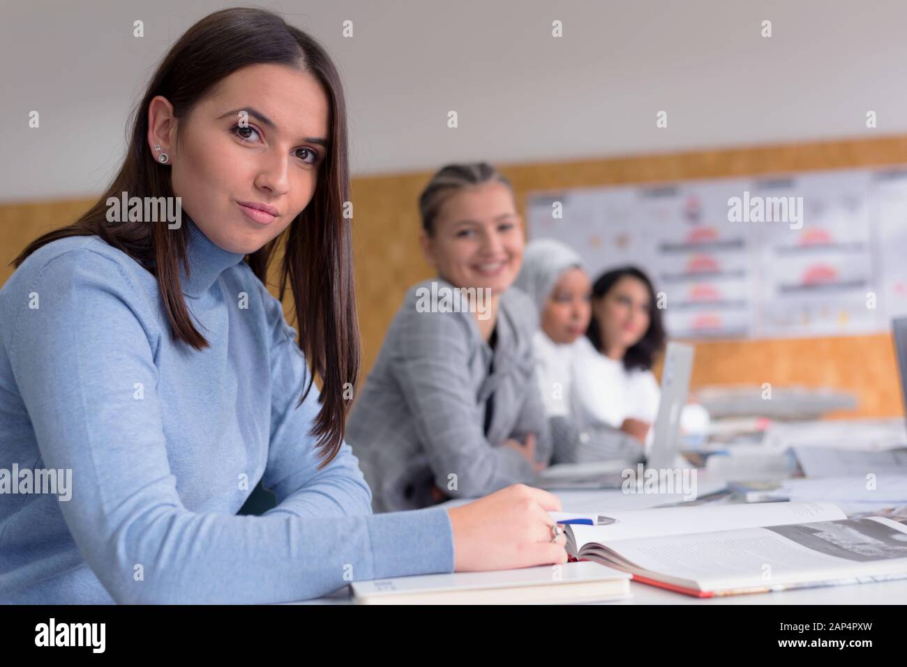 Group of university architecture students working on practice lessons ...