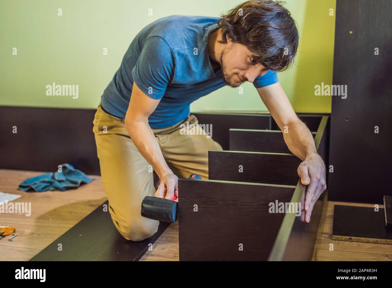 Frustrated Man Putting Together Self Assembly Furniture Stock Photo - Alamy