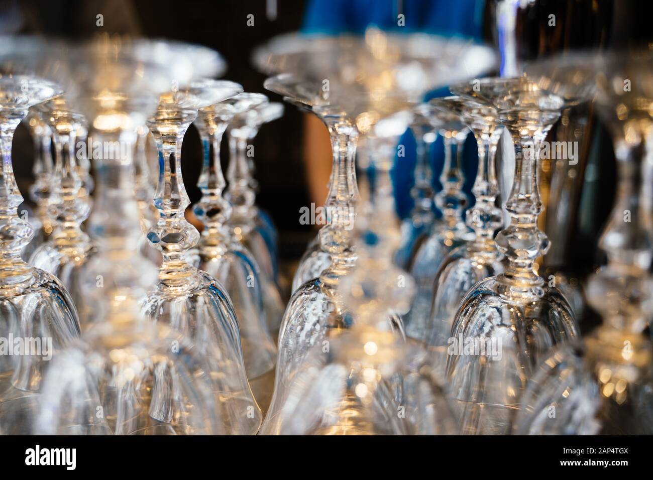 Crystal glass goblet upside down, a lot of Stock Photo - Alamy
