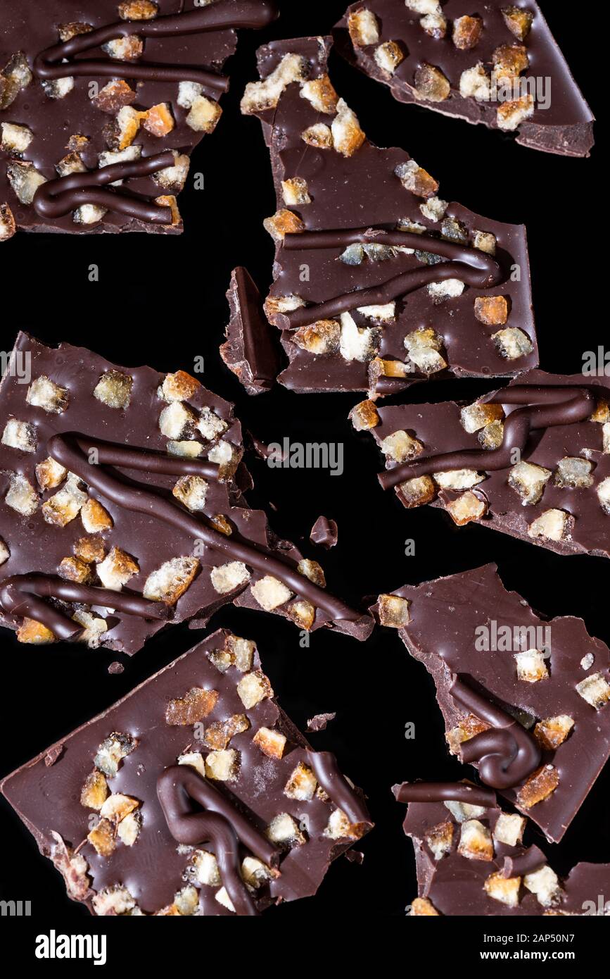 Broken Pieces of Chocolate Bar on Dark Background. Close Up View Stock ...
