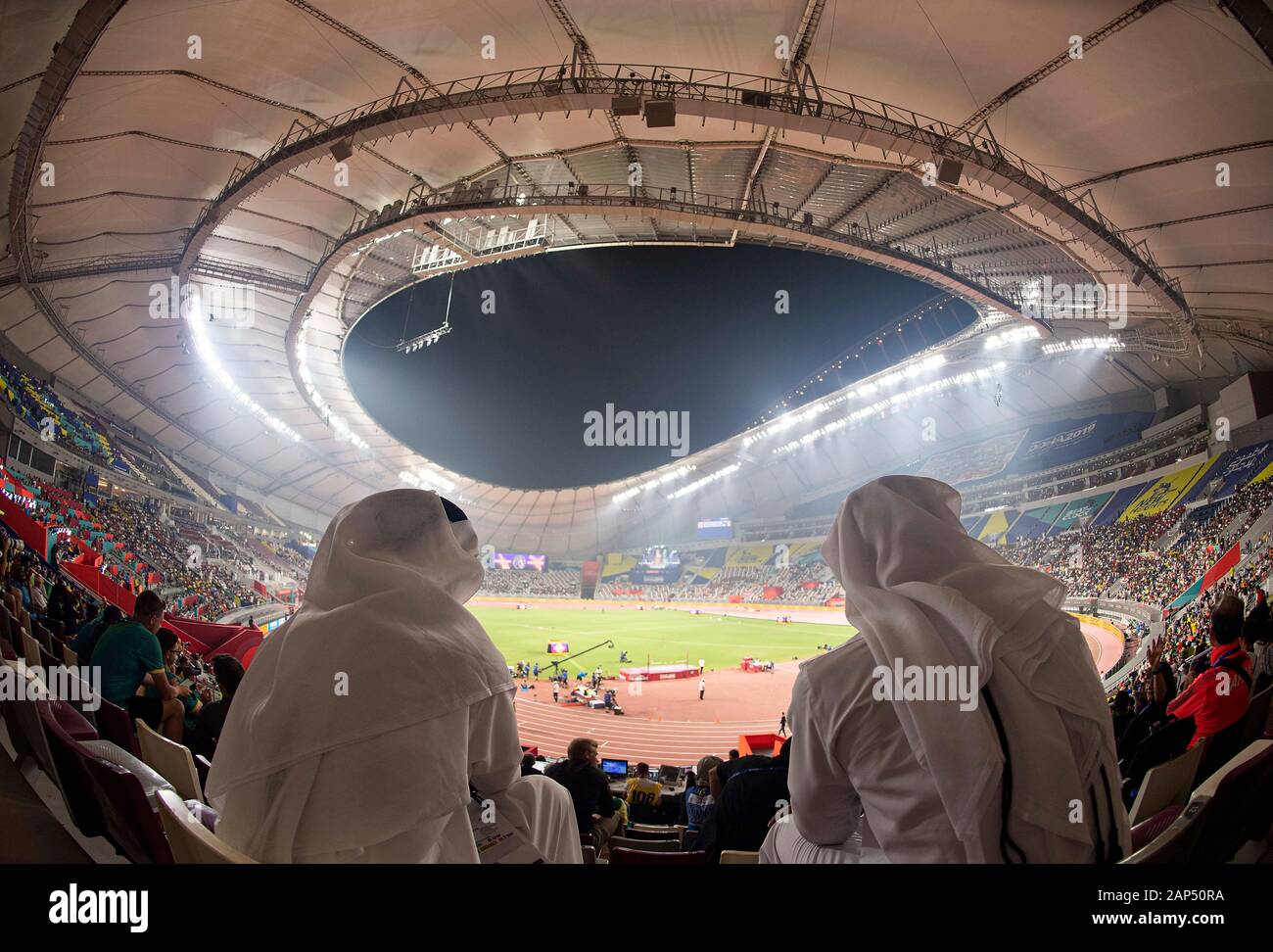 Feature, Khalifa International Stadium, with two men in traditional ...