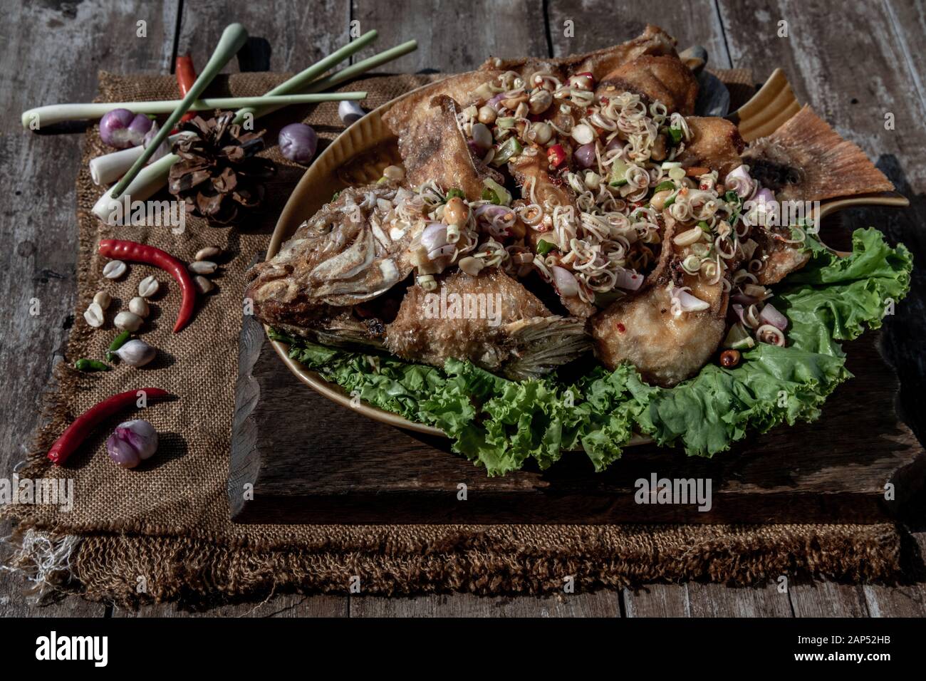 Deep fried whole Tubtim fish with spicy lemongrass salad, Thai food for ...