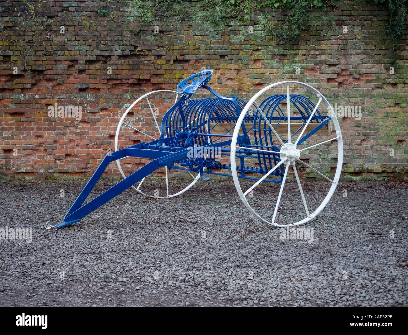 Horse drawn plow with seat and two wheels Stock Photo - Alamy
