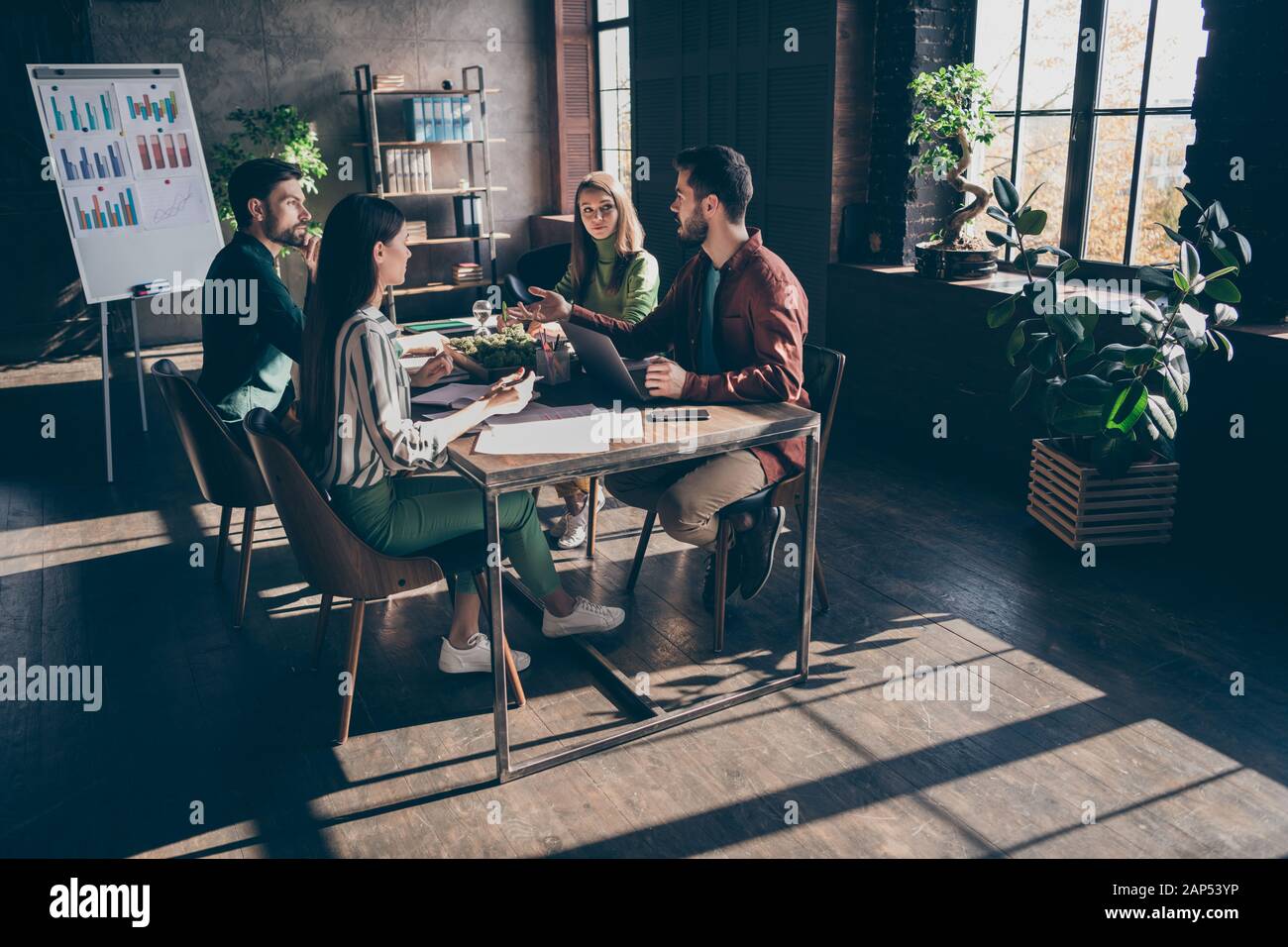 Full length photo of group people sit desk table have briefing ...