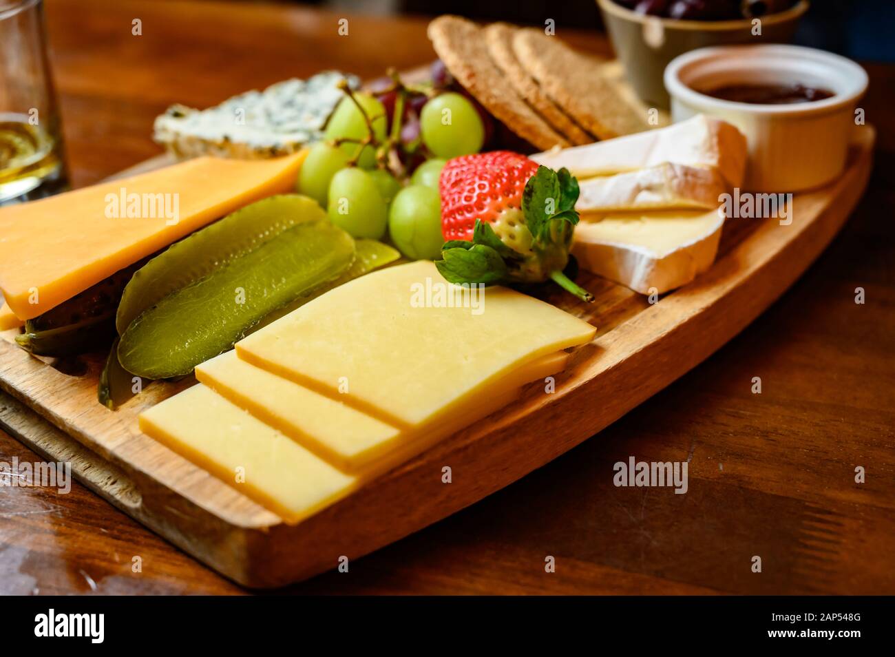 Tasting of original scottish cheese and whisky, plate with scottish ...