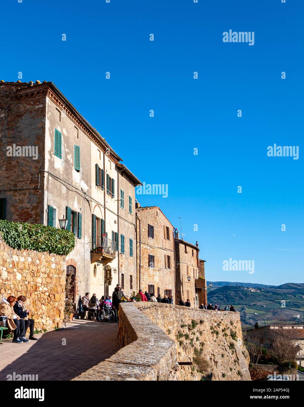 Pienza in Tuscany, Italy. View of the street on the walls that protect ...