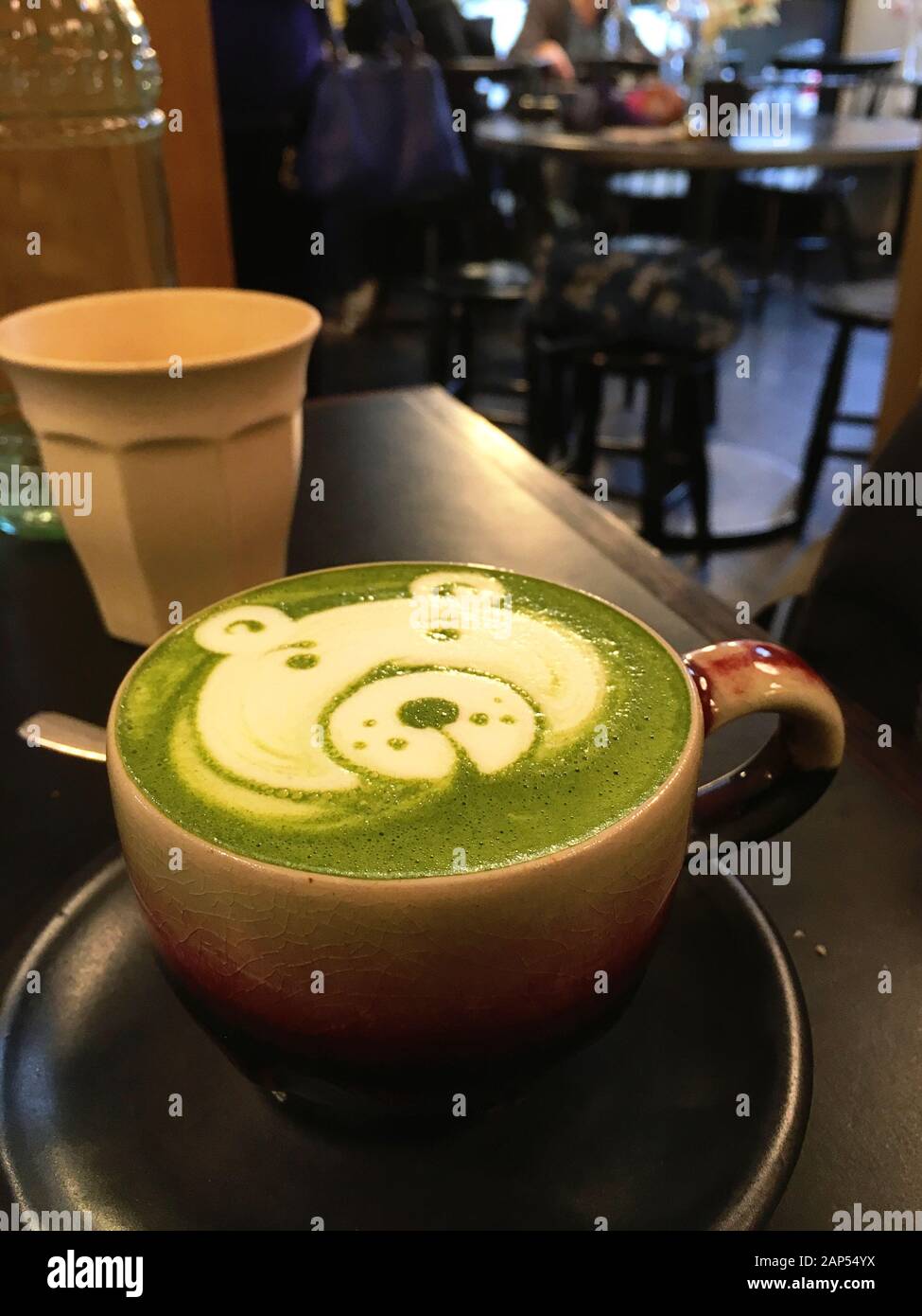 Perfect cute bear matcha latte art in a cafe Stock Photo - Alamy