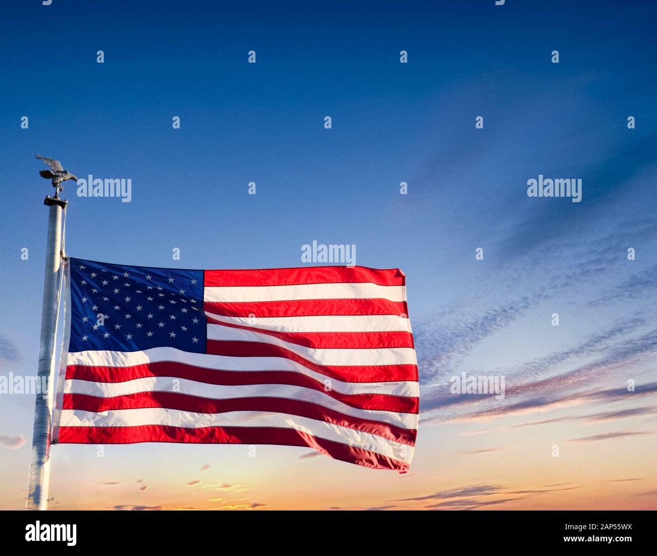 American Flag in the Wind at Dawn Stock Photo - Alamy