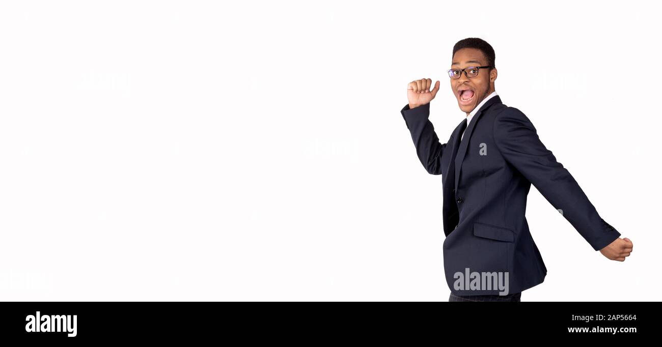 Excited young black man jumping at studio Stock Photo - Alamy Excited young black man jumping at studio Stock Photo - Alamy