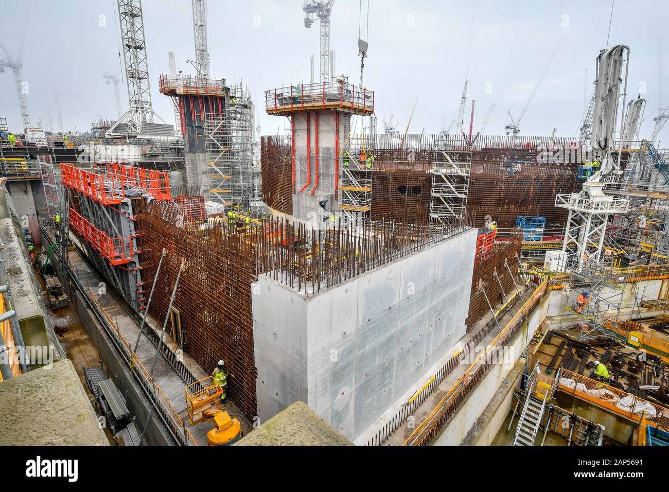 Hundreds of tons of steel reinforcement and concrete form parts of the ...