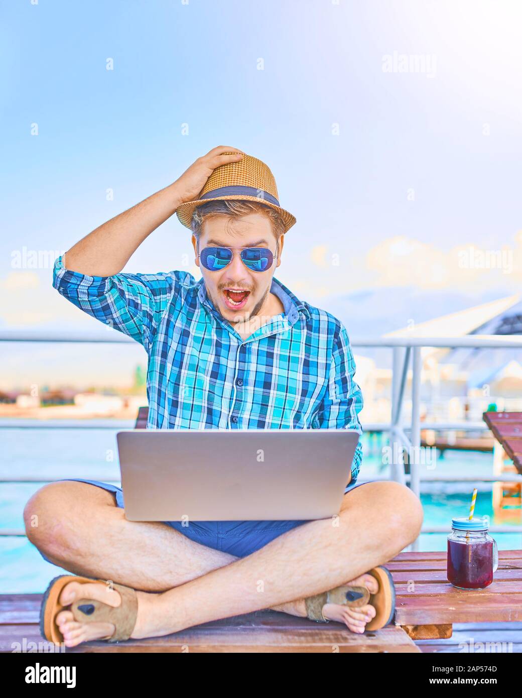 Concept of relaxing at sea. The man is working on time. The amazing ...