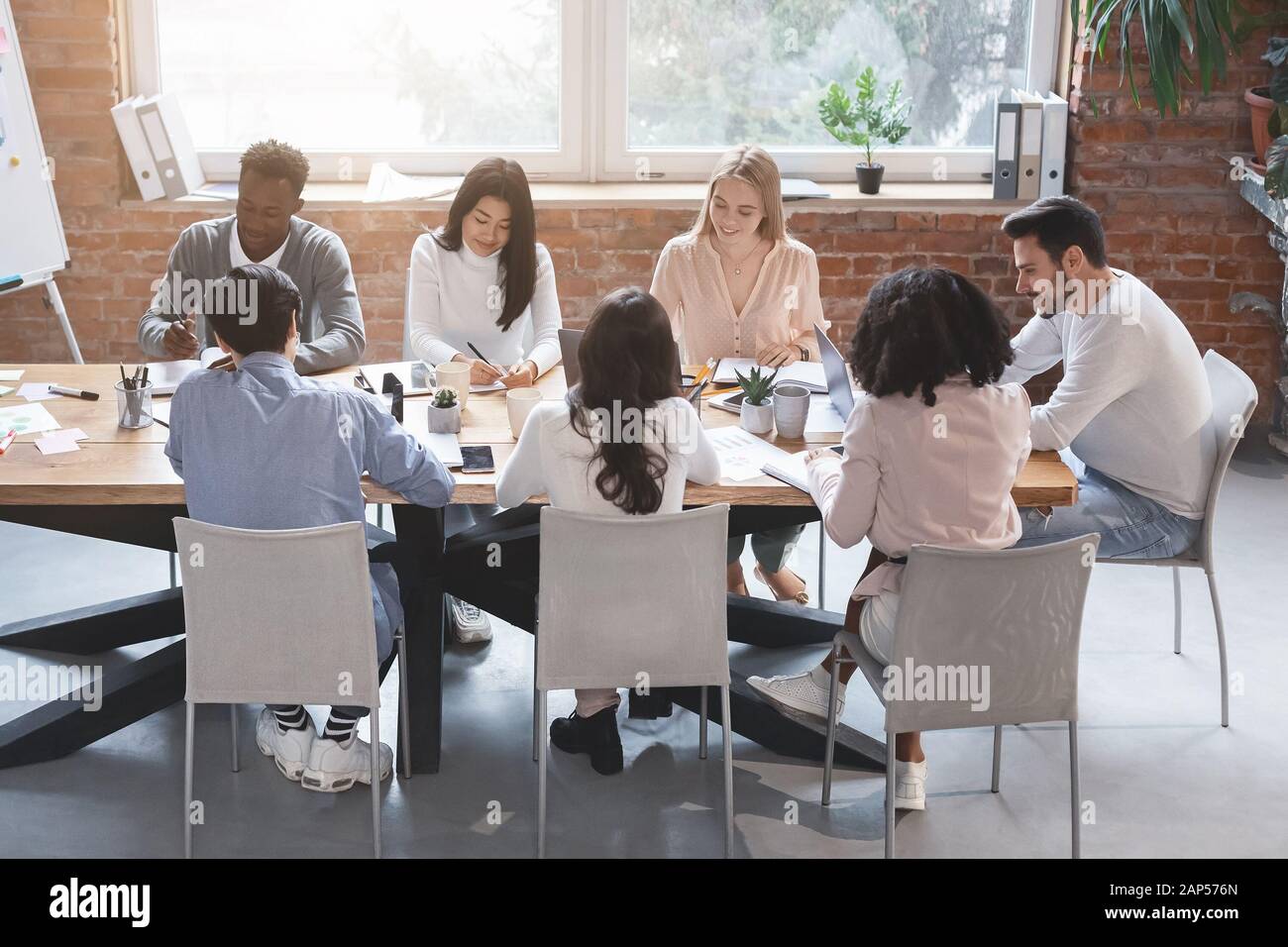 Multiethnic group people discussing career hi-res stock photography and ...