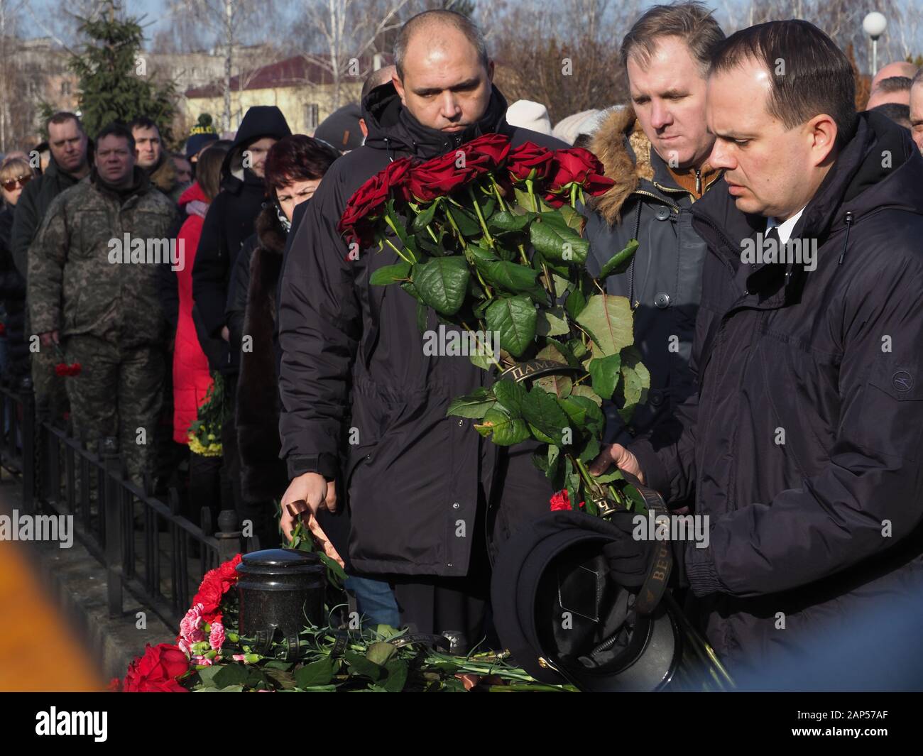 A man says goodbye to the ashes of a dead pilot. The funeral of the ...