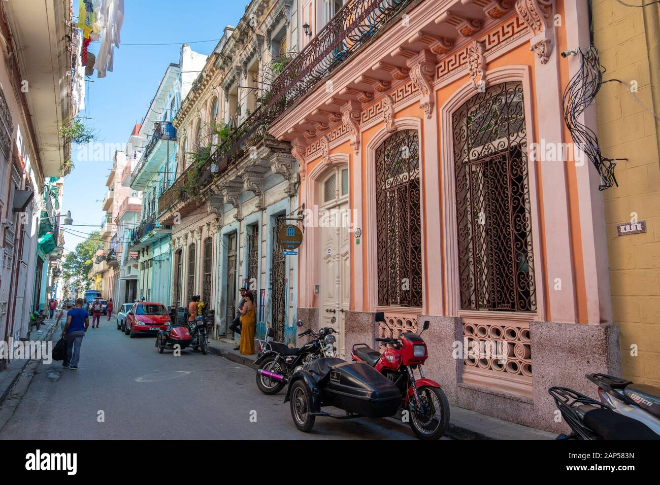 Colorful pastel colored buildings viewed from the street , Havana, Cuba ...