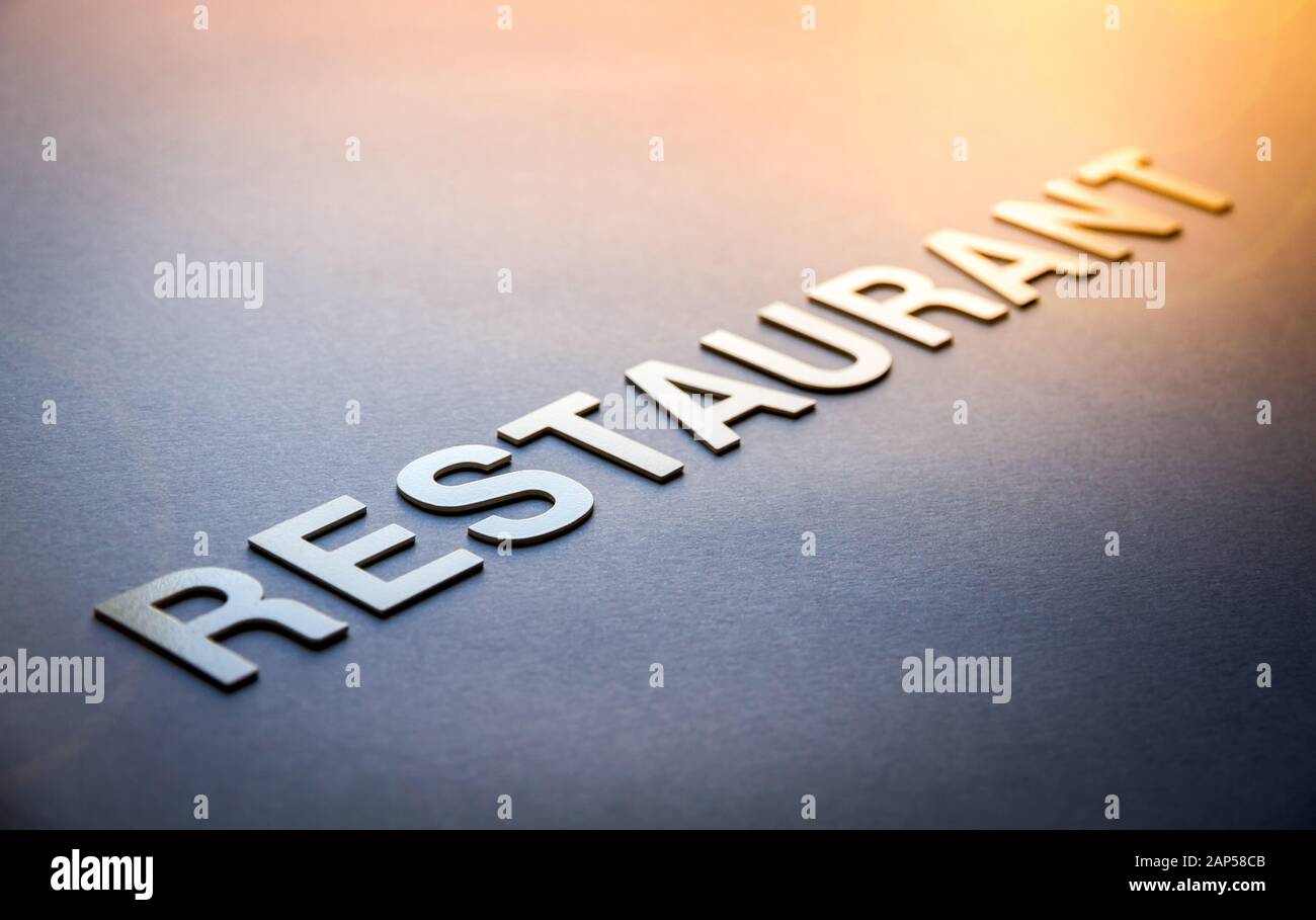 Word restaurant written with white solid letters on a board Stock Photo ...