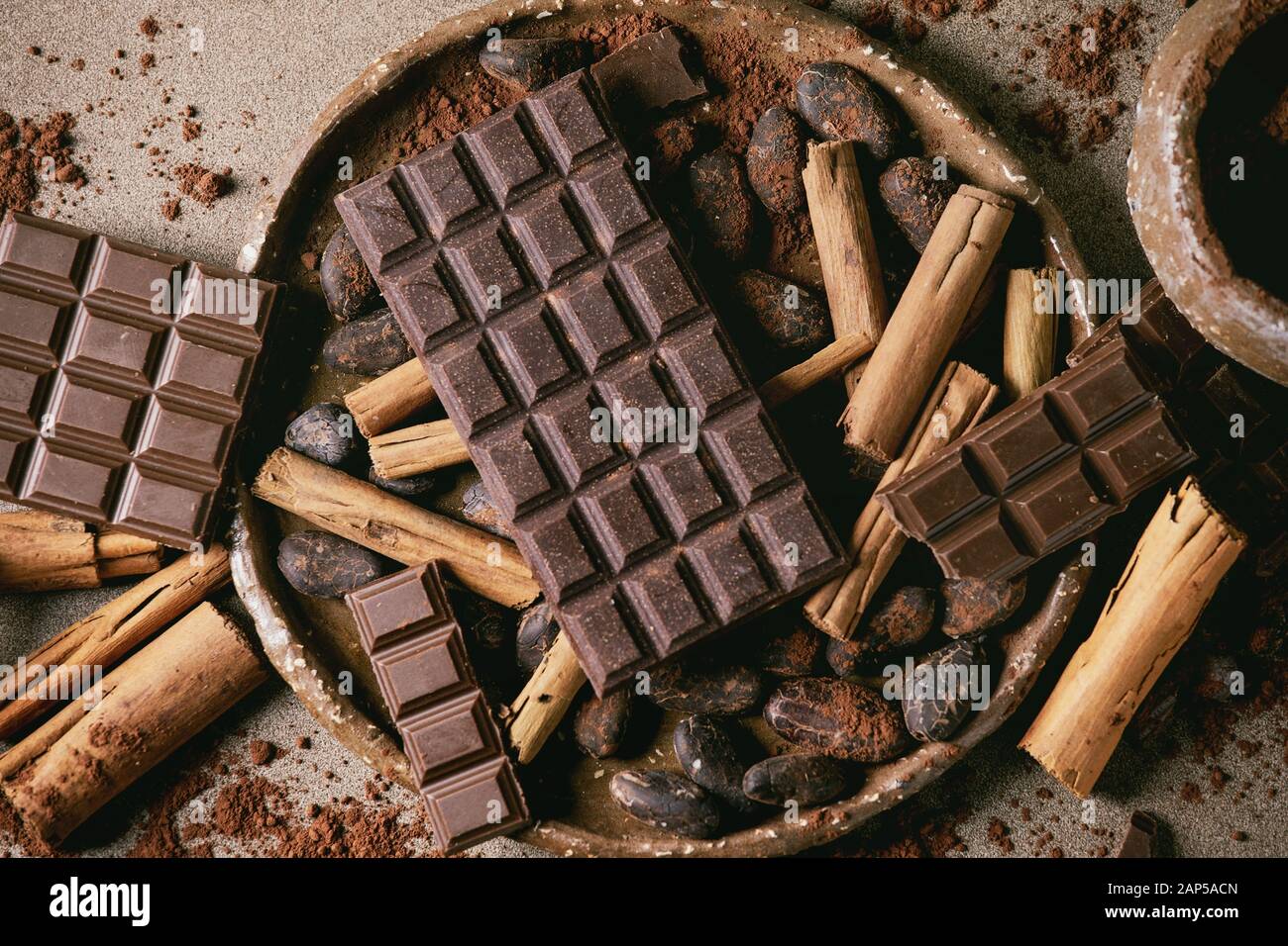 Dark and milk chocolate bar whole and chopped with cocoa beans, cocoa ...