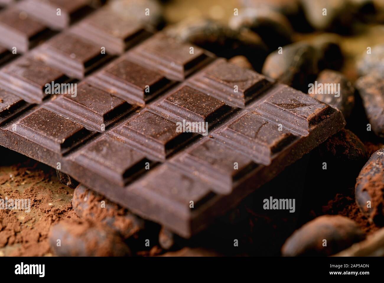 Dark chocolate bar with cocoa beans, cocoa powder. Food background ...