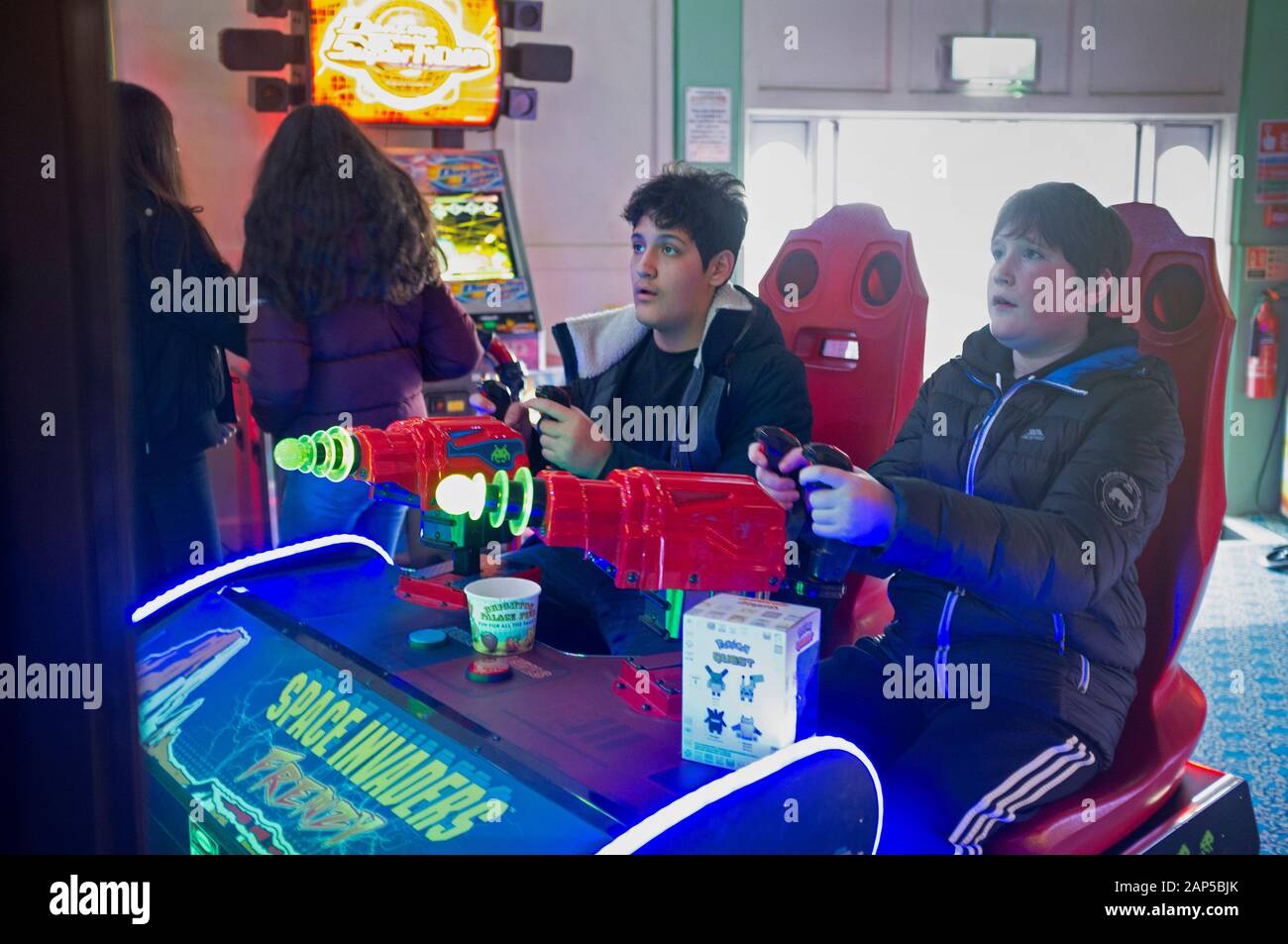 Fun in a games arcade in Brighton Stock Photo - Alamy
