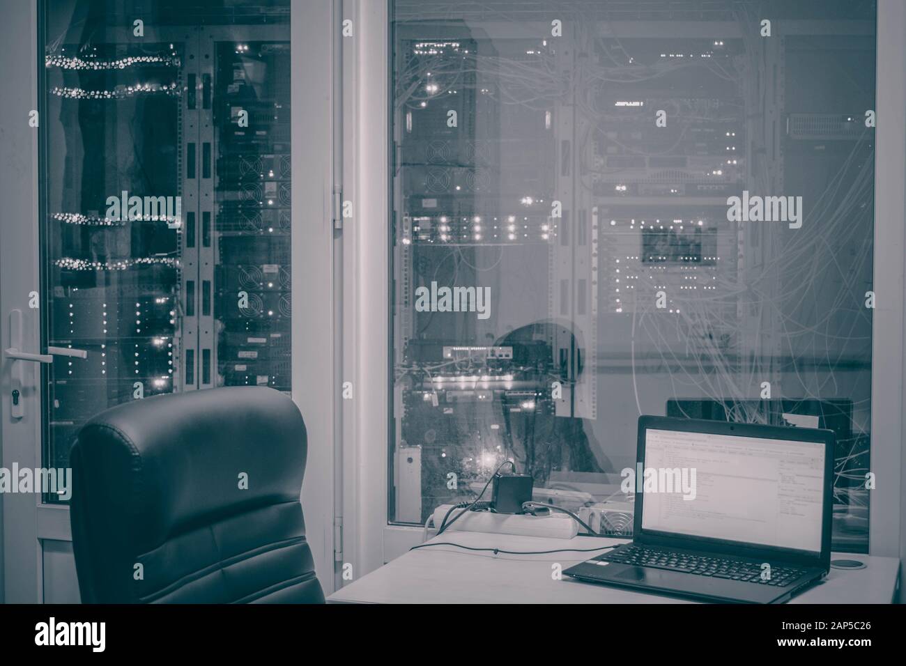 Black and white photo of an empty workplace system administrator in the ...
