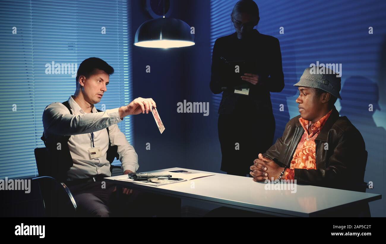 Female detective interrogation hi-res stock photography and images - Alamy