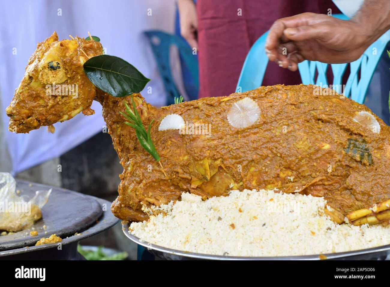 Wedding ceremony by goat full roast Stock Photo - Alamy