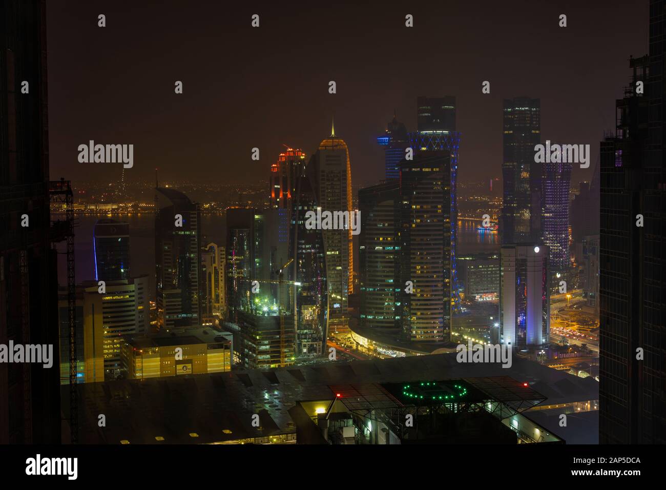 View over Doha downtown illuminated at night. January 15,2020 in Doha ...