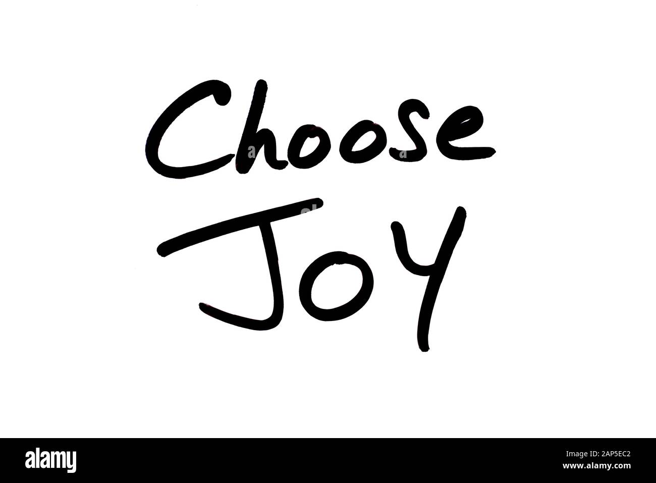 Choose JOY handwritten on a white background Stock Photo - Alamy