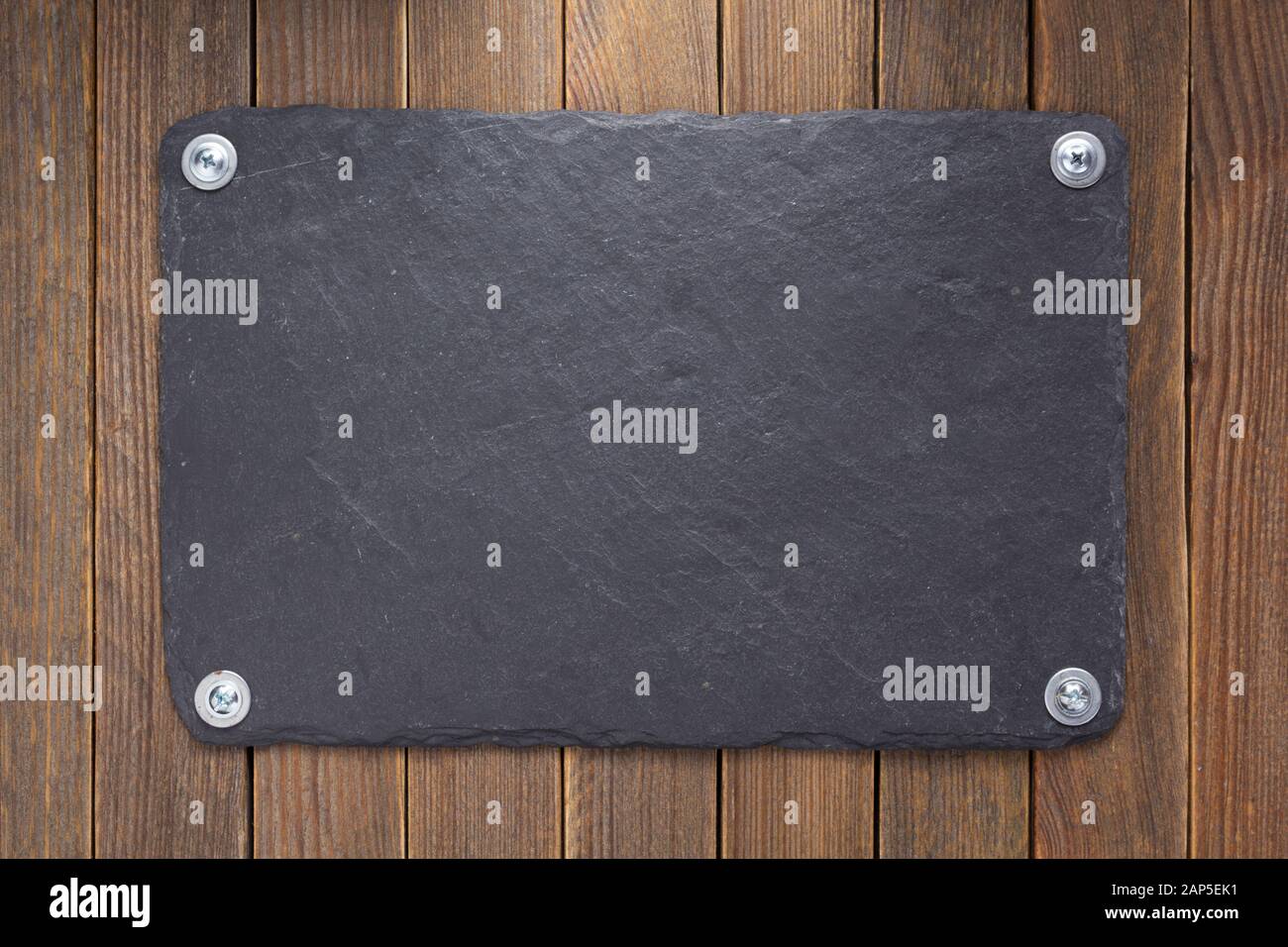 nameplate at wooden background texture surface, with screws Stock Photo ...