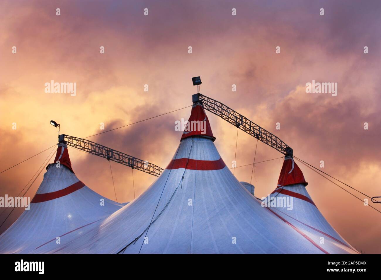 Circus tent under the dramatic sunset sky Stock Photo - Alamy