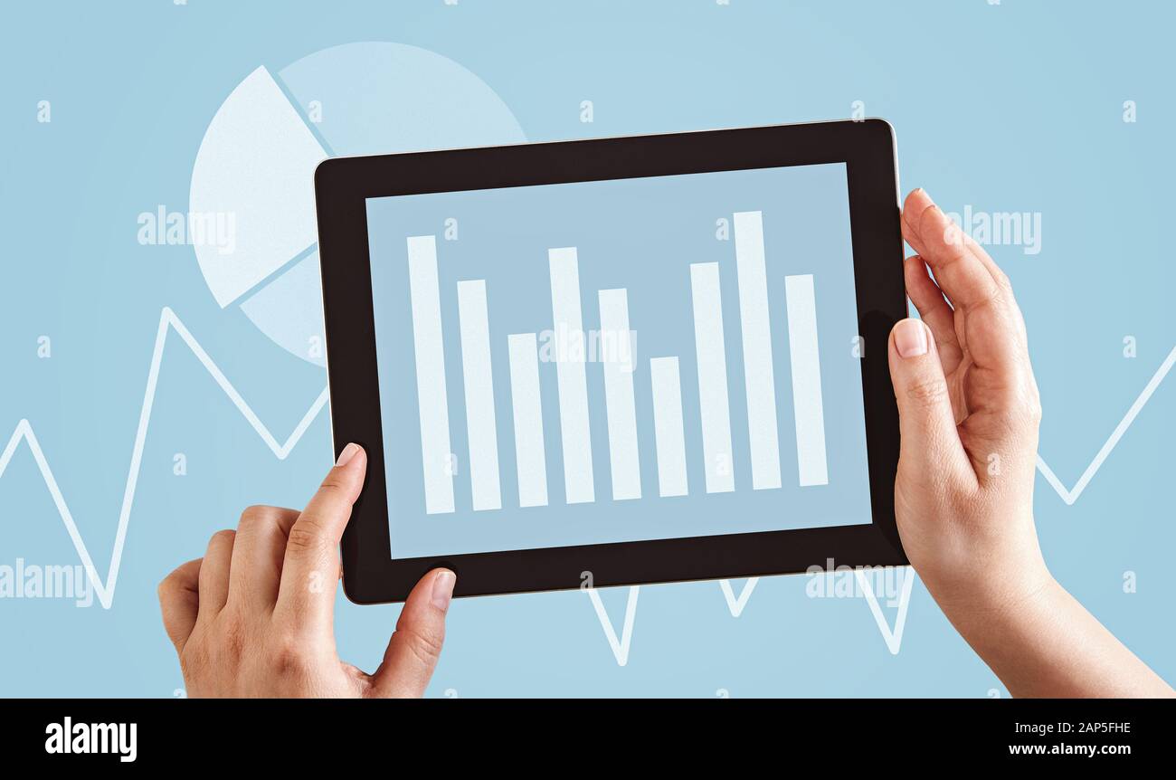 Blue charts and graphs. Analysis chart graph concept. Hands using ...