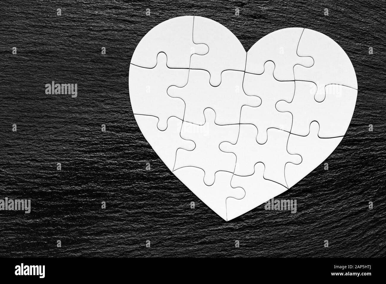 Heart object made of puzzle pieces. Make complete heart. Jigsaw puzzle ...