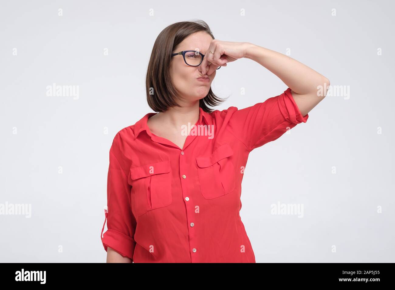 Plugging nose hi-res stock photography and images - Alamy