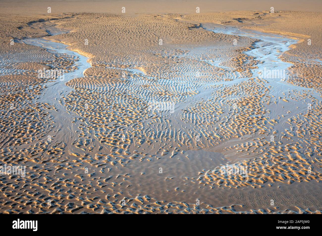 Water draining from sand hi-res stock photography and images - Alamy