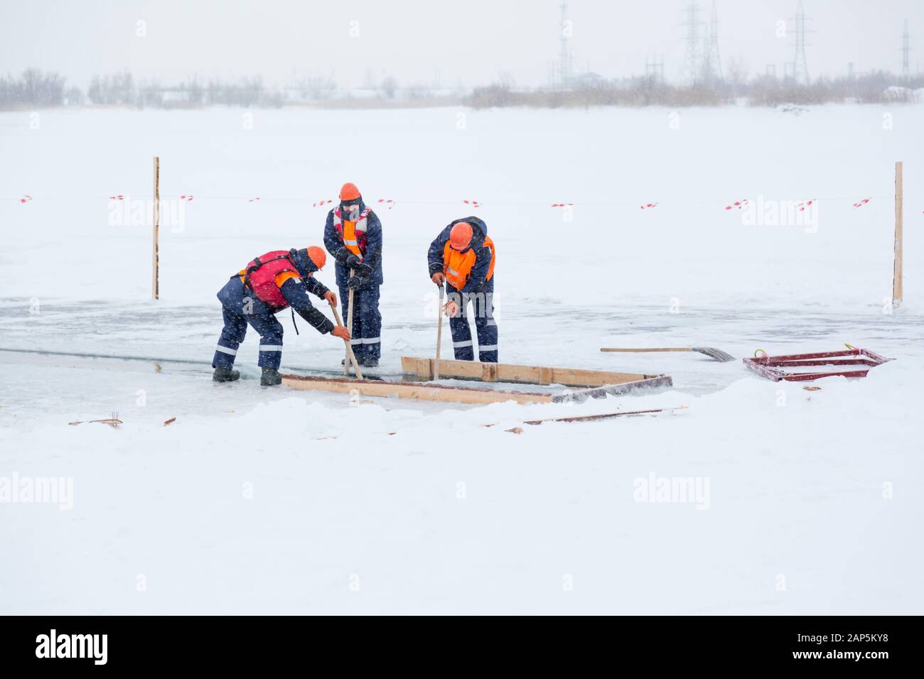 Sailors work at the lane with a fenced wooden formwork Stock Photo - Alamy