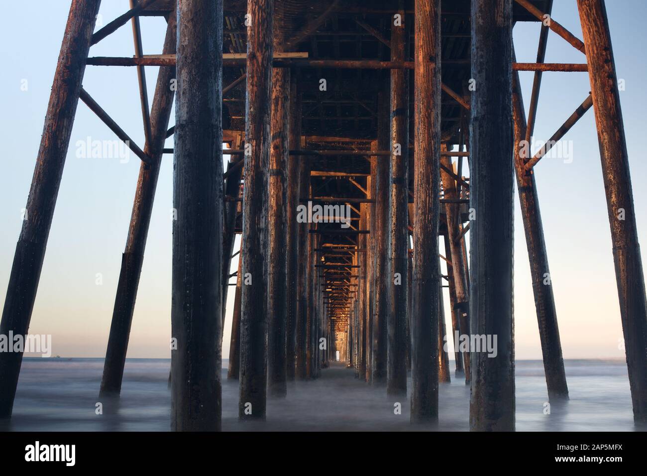 Underneath oceanside pier hi-res stock photography and images - Alamy
