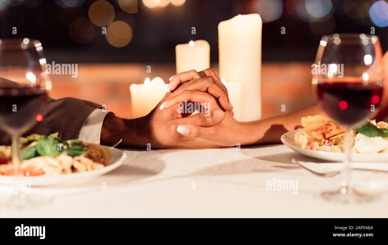 Unrecognizable Spouses Holding Hands Interlocking Fingers On Table In ...
