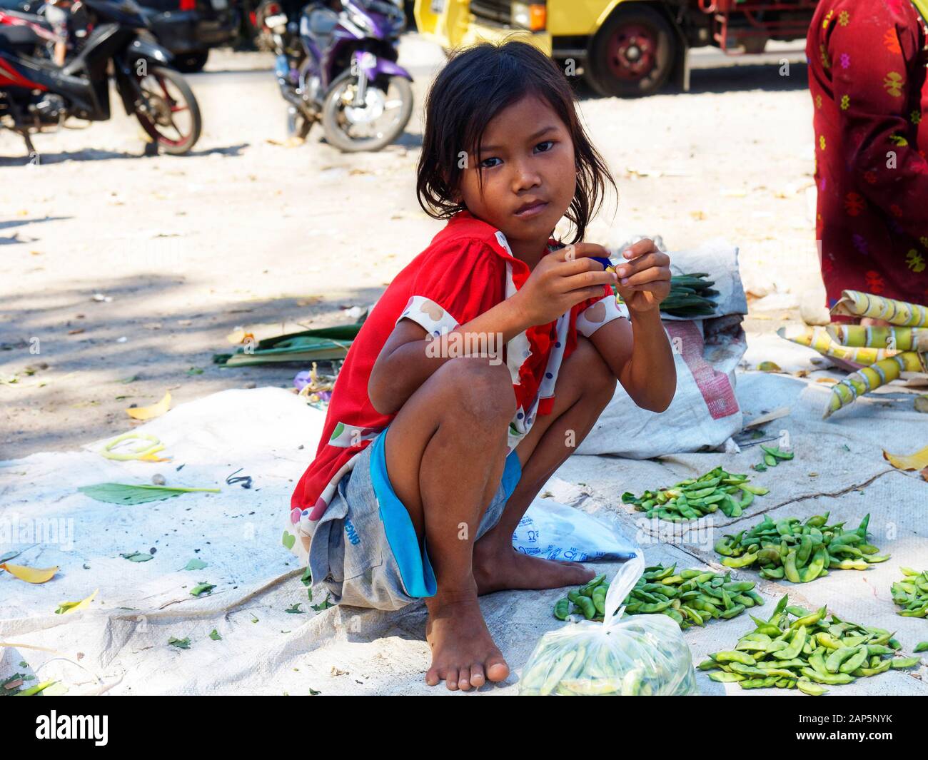 Young girl in the market of Bayan, Lombok island, Indonesia, Asia Stock ...