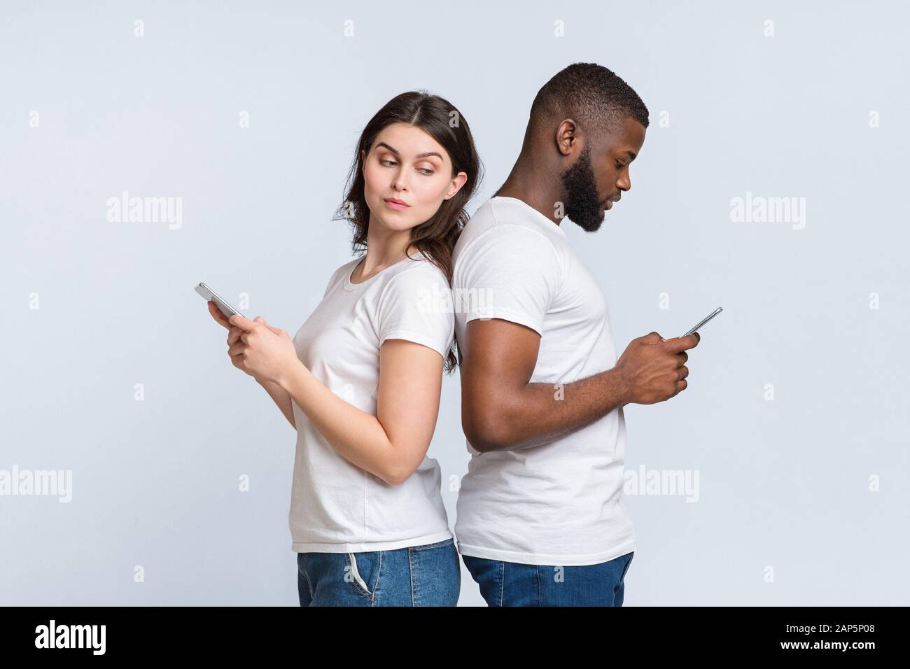 Curious Woman Peeking Over Shoulder How Her Boyfriend Texting With ...