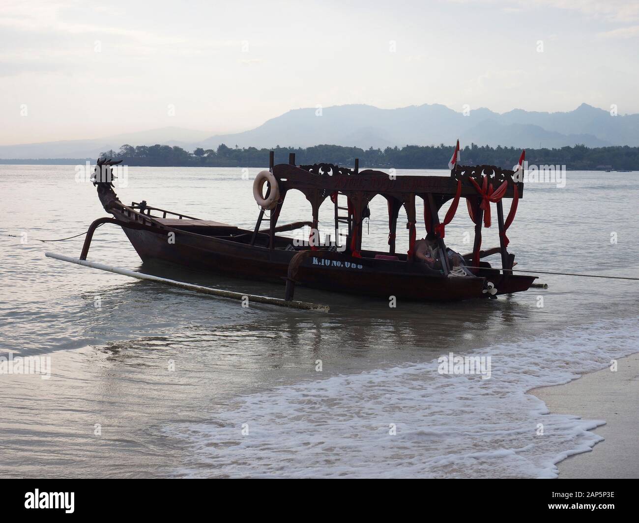 Traditional boat, Sire Beach, Tugu resort, Lombok island, Indonesia ...