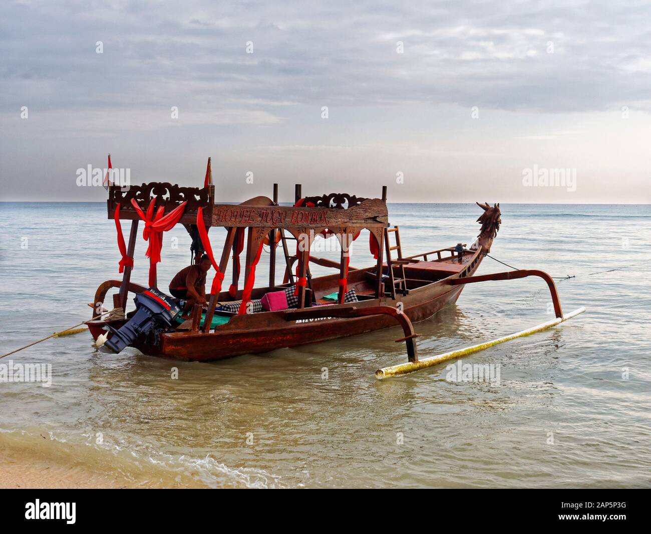 Traditional boat, Sire Beach, Tugu resort, Lombok island, Indonesia ...