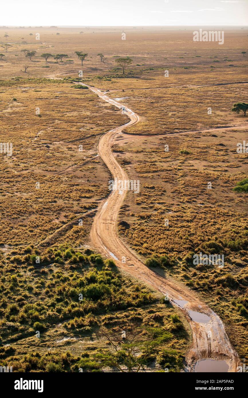 Morning hot air balloon ride over the endless plains of the Serengeti ...