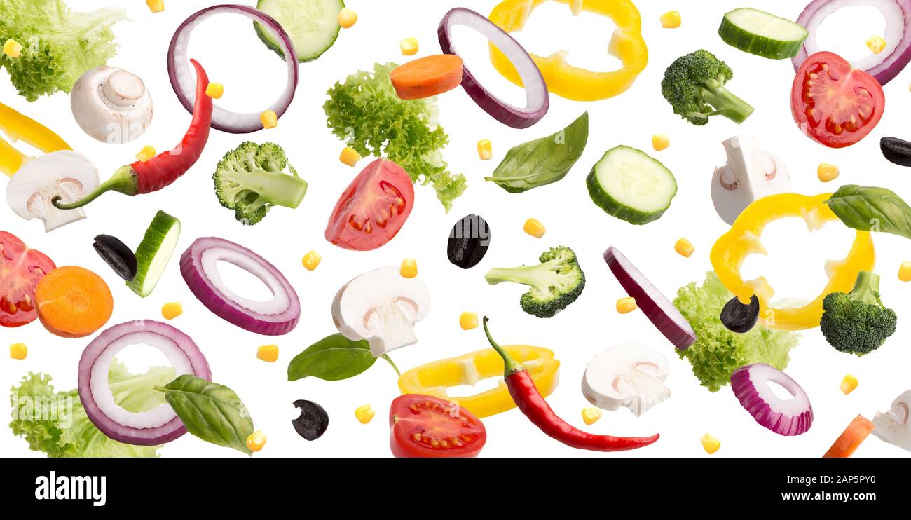 Flying vegetables mix background isolated on white Stock Photo - Alamy
