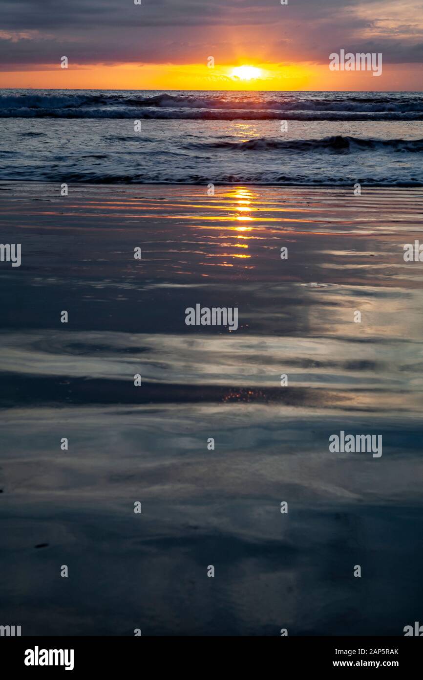 Sunset over the Atlantic Ocean waves Stock Photo - Alamy